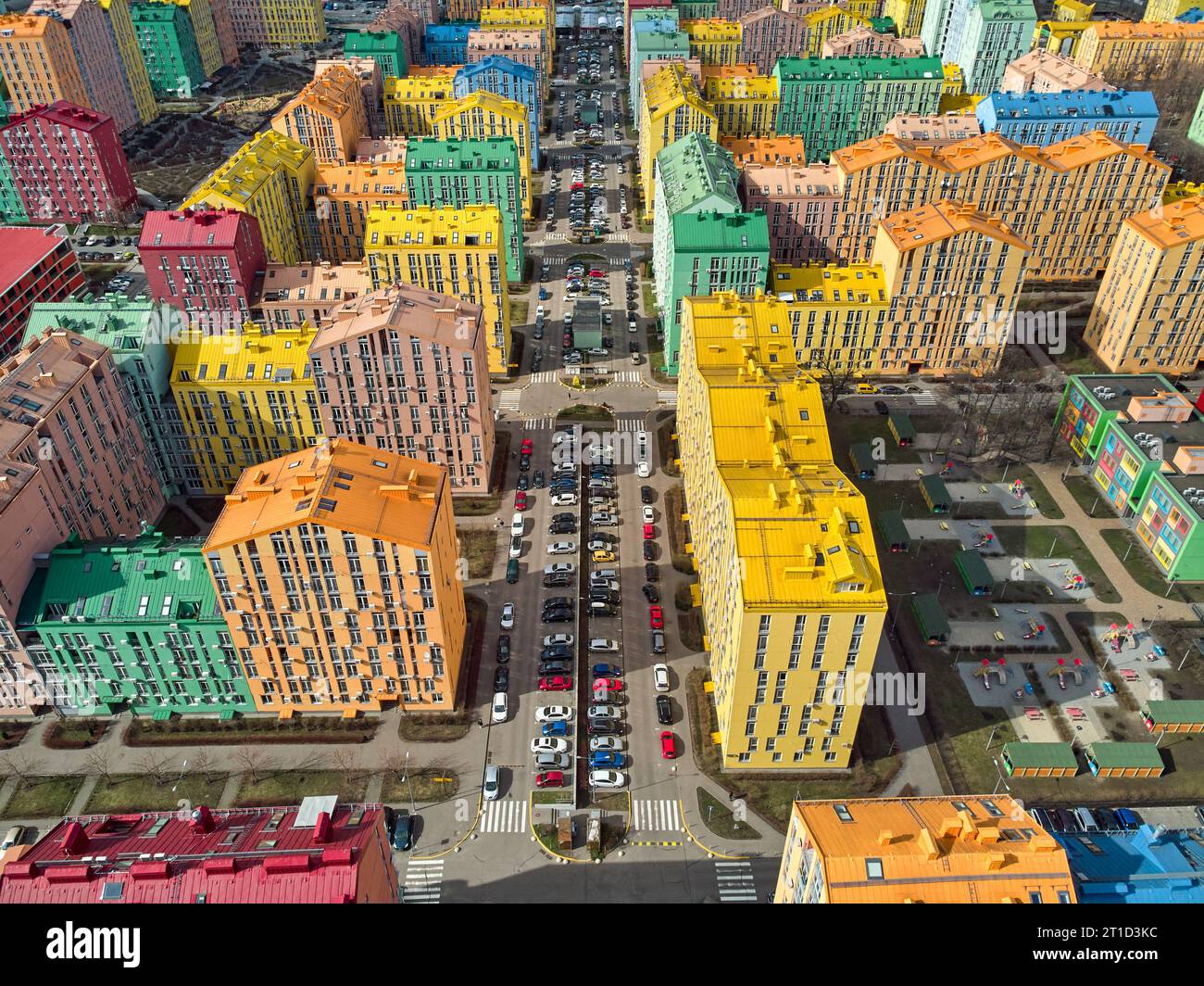 Aerial top view of a drone in the colorful modern city. Comfort town ...