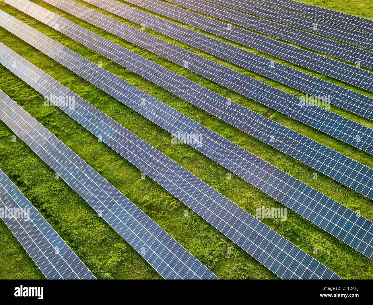 Aerial view of solar power plant in green meadow at sunny day Stock ...