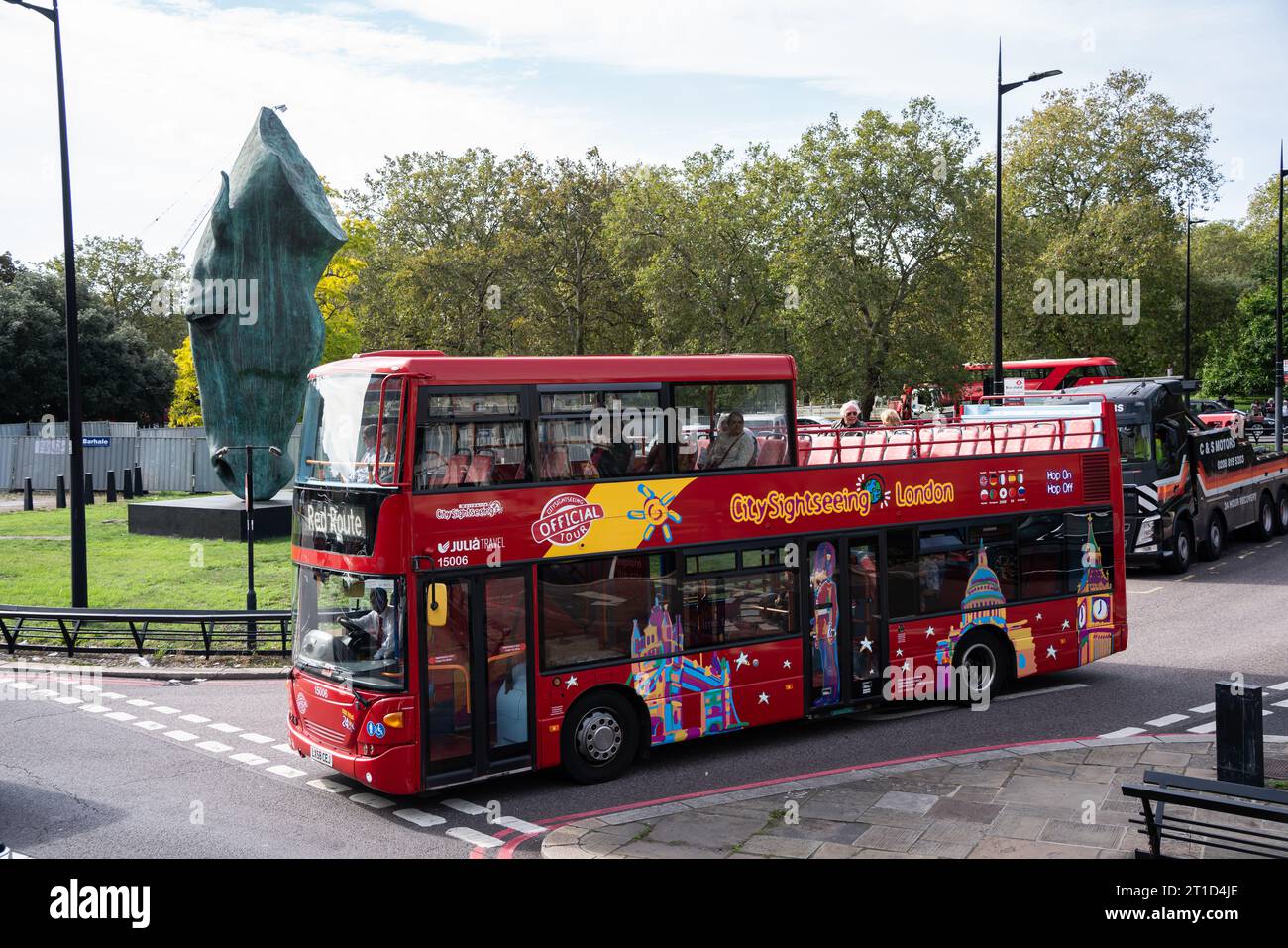 Streets of London and double decker tourist buses, hop on hop off tours ...