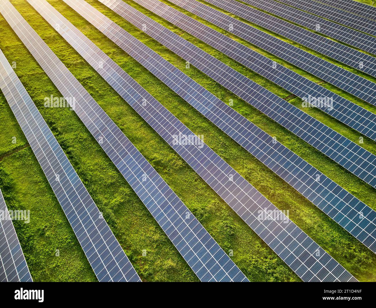 Aerial view of solar power plant in green meadow at sunny day Stock ...