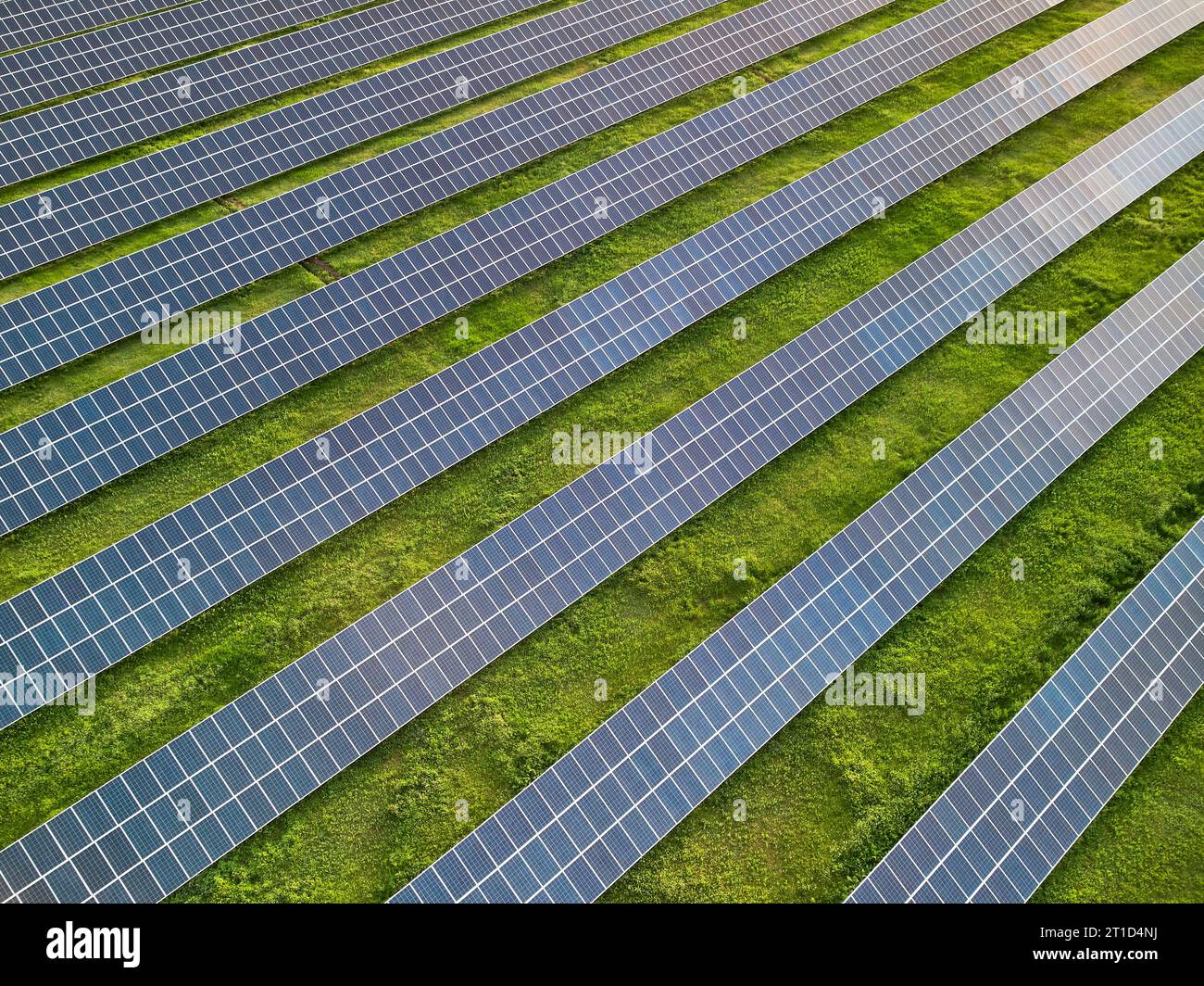 Aerial view of solar power plant in green meadow at sunny day Stock ...