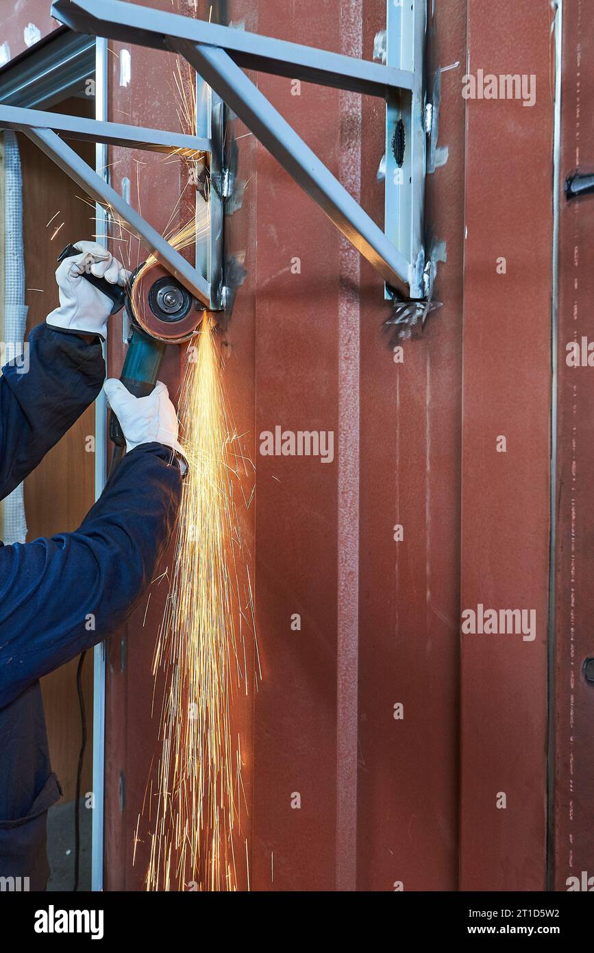 Worker grinding metal workshop close hi-res stock photography and ...
