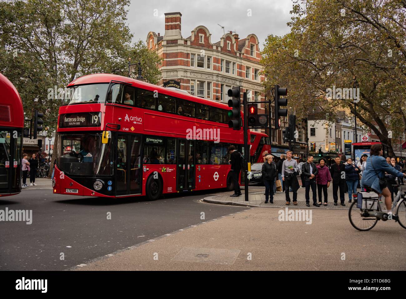 Streets of London and double decker tourist buses, hop on hop off tours ...