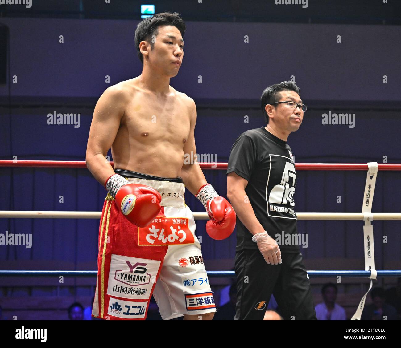 Japan's Kazuto Takesako, left, and World Sports Boxing Gym chairman ...