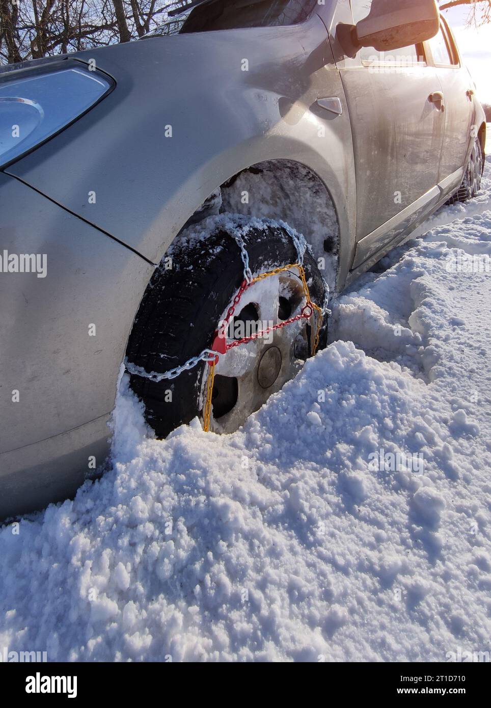snow chain on a wheel in deep snow in winter road Stock Photo - Alamy