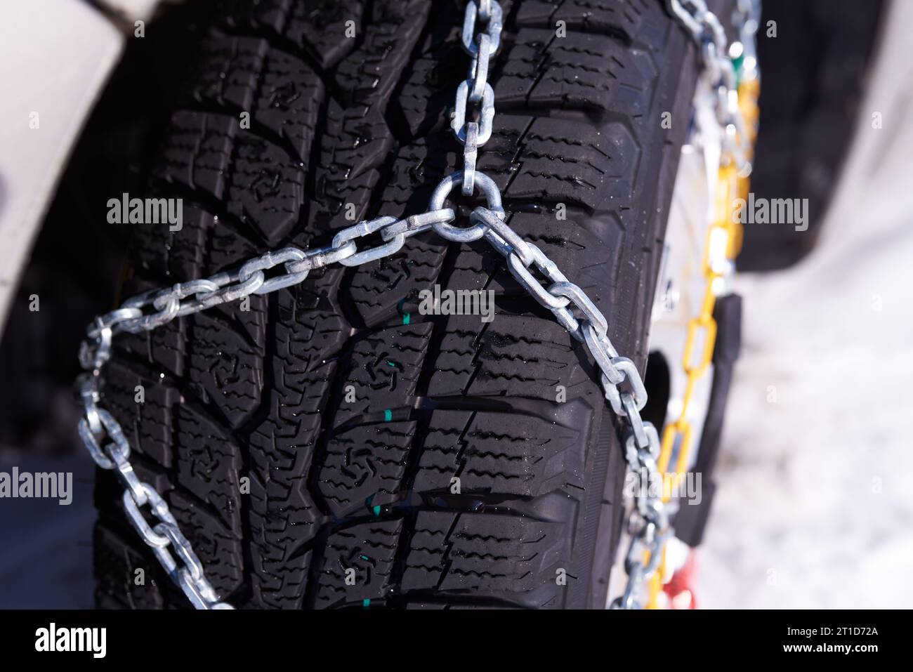 snow chain on a wheel in deep snow in winter road Stock Photo - Alamy