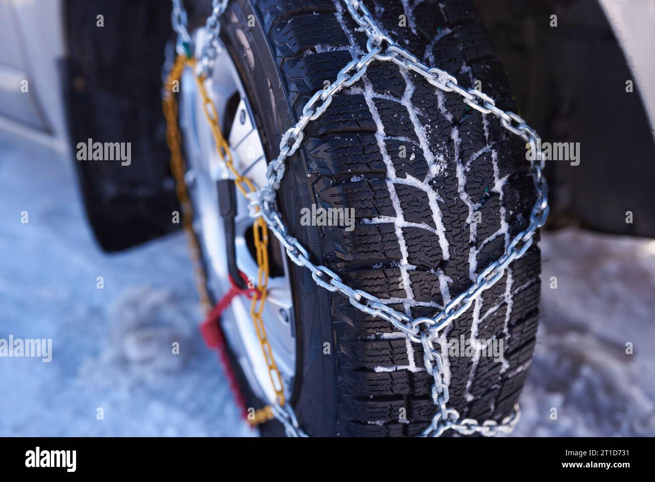 snow chain on a wheel in deep snow in winter road Stock Photo - Alamy