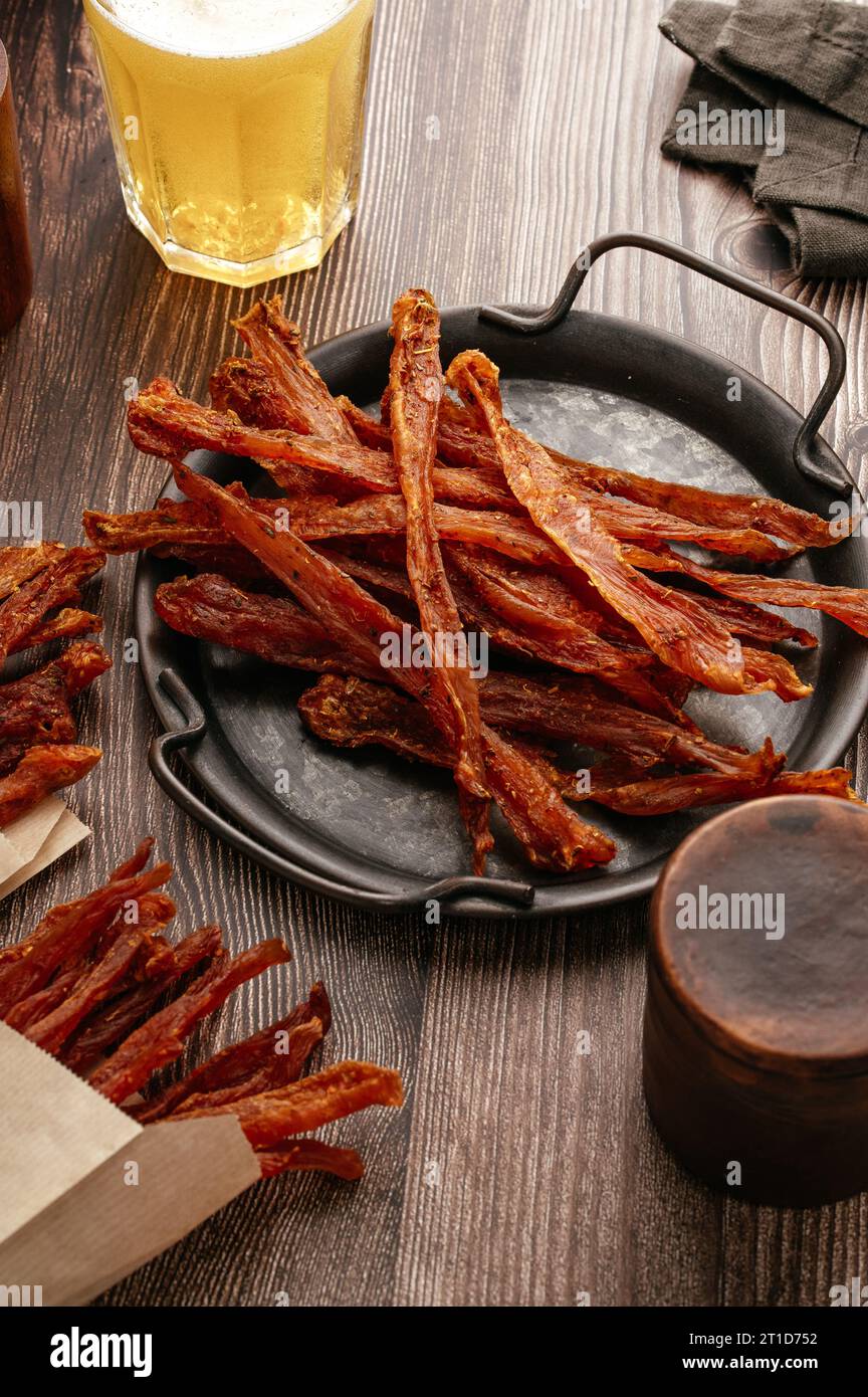 Dried chicken meat slices with spices and herbs Stock Photo - Alamy