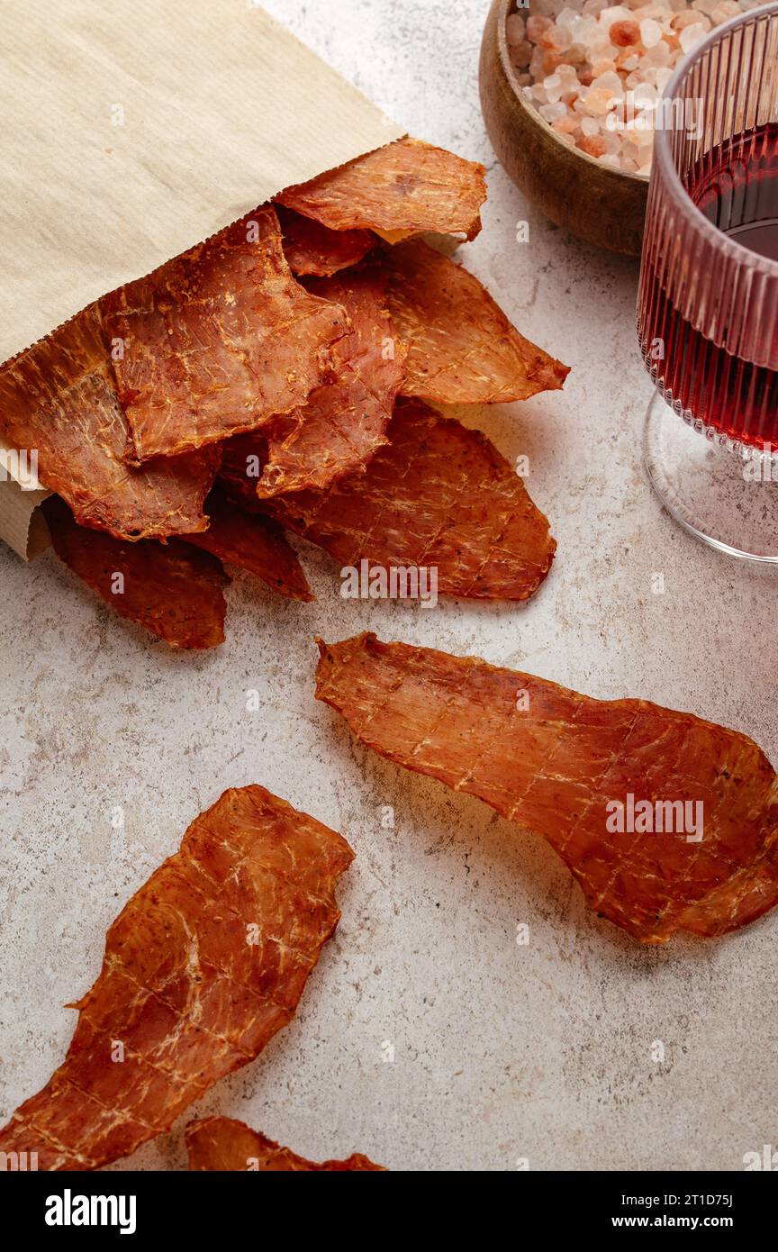 Dry chicken meat over wooden Stock Photo - Alamy