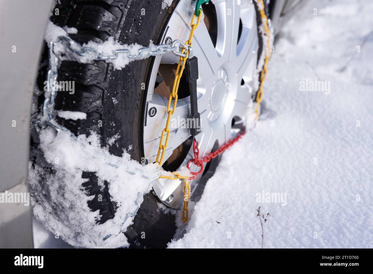 snow chain on a wheel in deep snow in winter road Stock Photo - Alamy