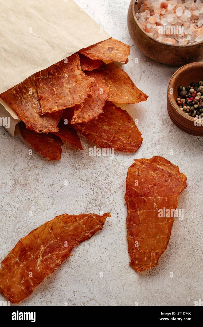 Dry chicken meat over wooden Stock Photo - Alamy