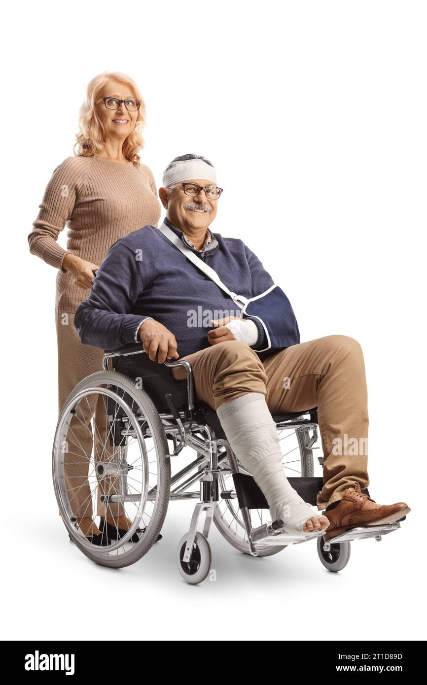 Woman standing behind injured man in a wheelchair isolated on white ...