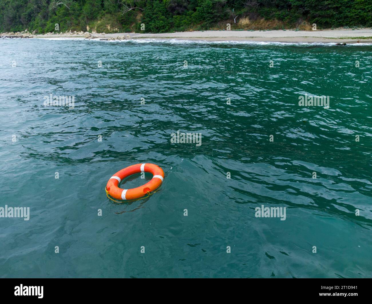 Life belt floating in ocean hi-res stock photography and images - Alamy