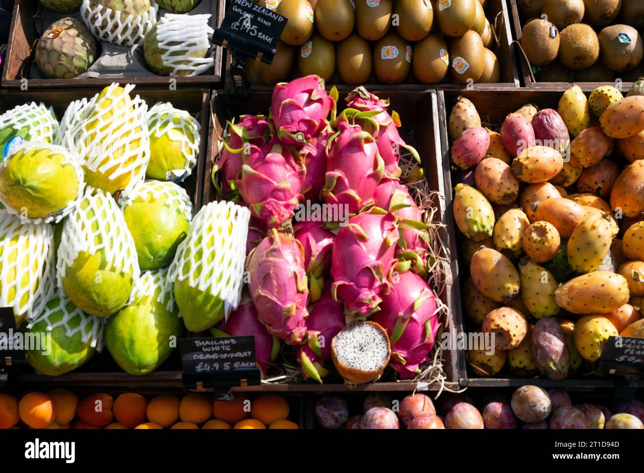 Crates of unusual fruit fruits for sale on display at greengrocer Bora ...