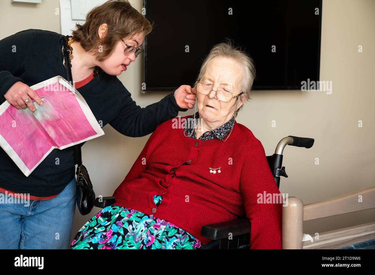 Daughter with Down Syndrome waking up her grandmother, sleeping in a ...