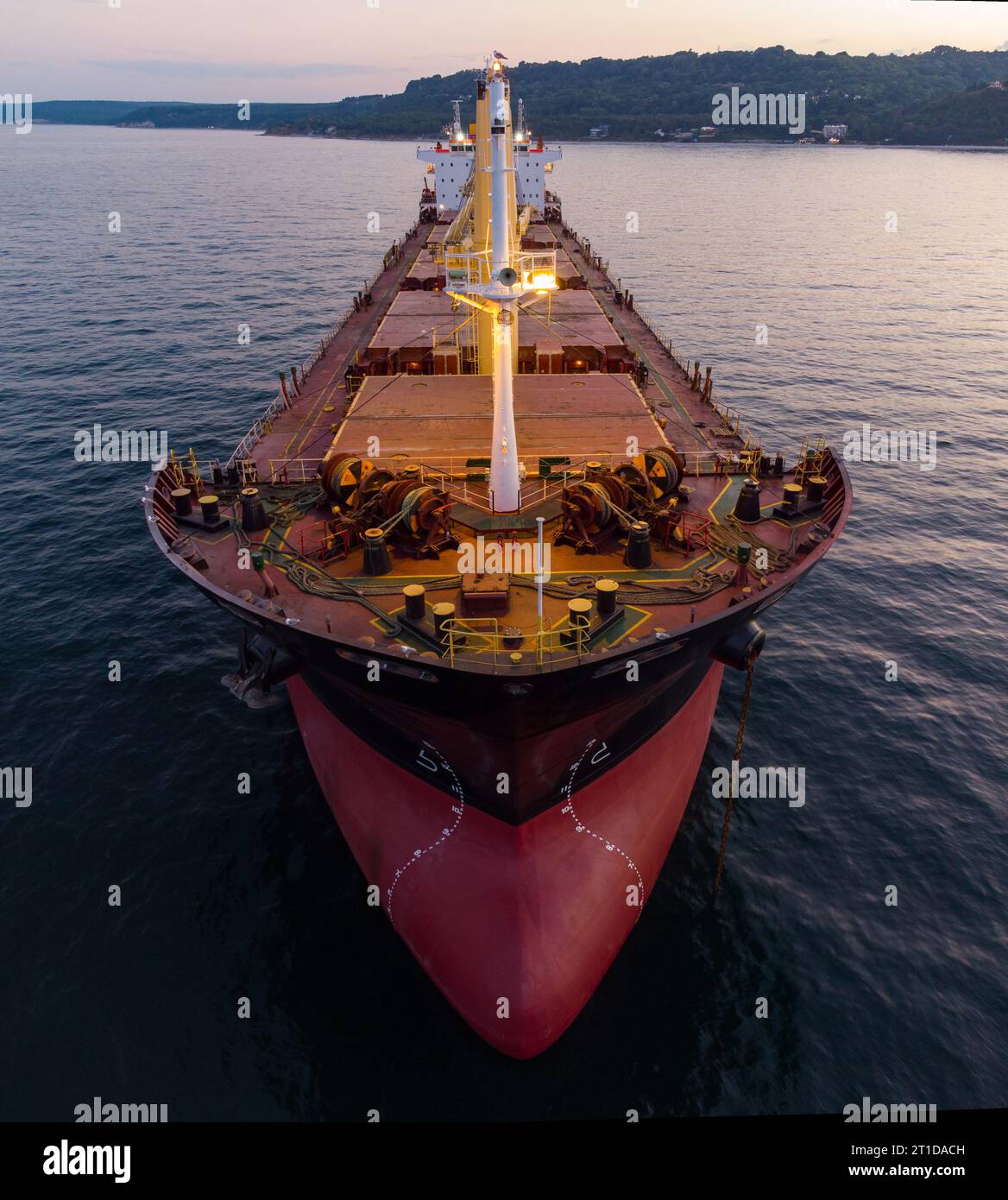 Large general cargo ship tanker bulk carrier, aerial top view at night ...