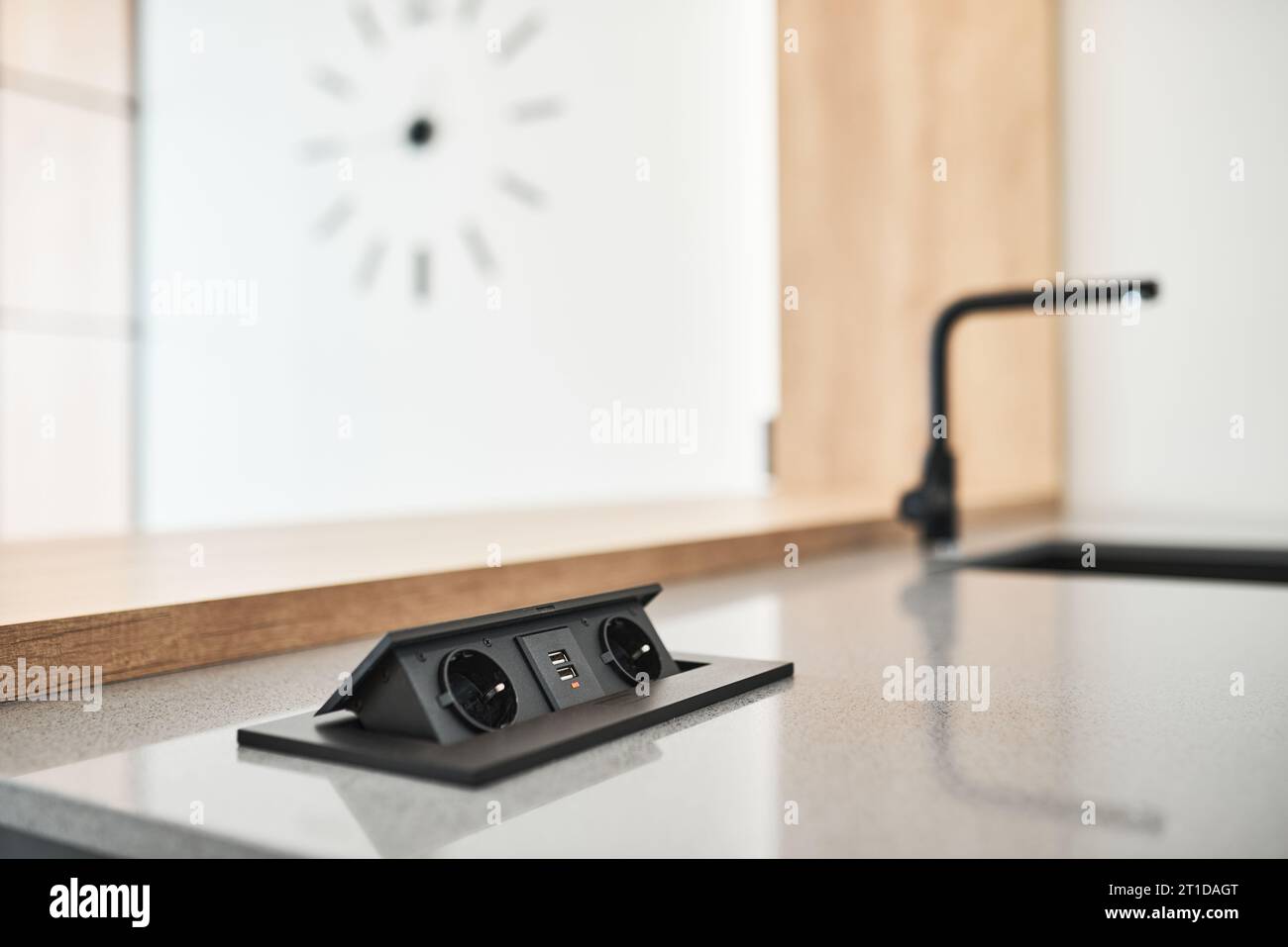 socket on the worktop in the modern kitchen closeup Stock Photo - Alamy