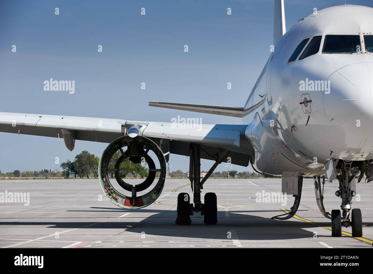 passenger plane with removed engine under repair outdoor Stock Photo ...