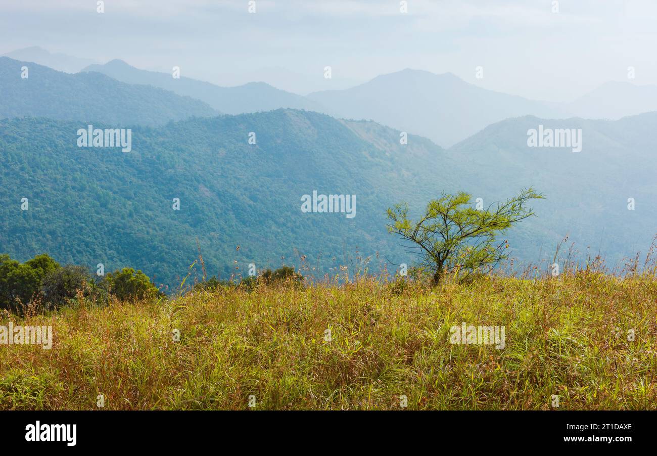View across the Western Ghat mountains on a fine morning with forested ...