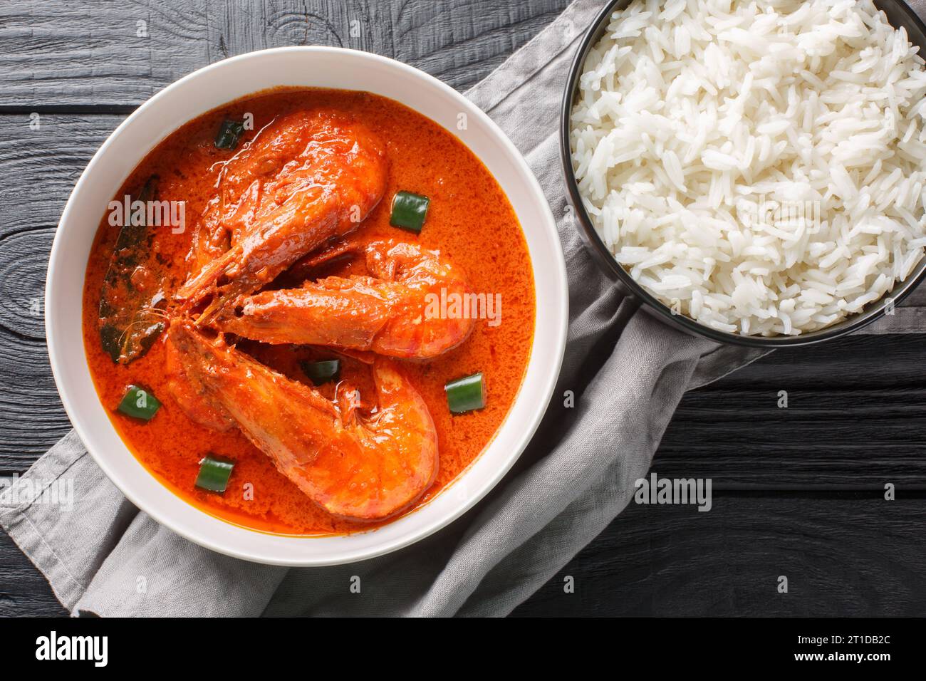 Chingri malai curry also known as prawn malai curry made from tiger and king prawns and coconut ...