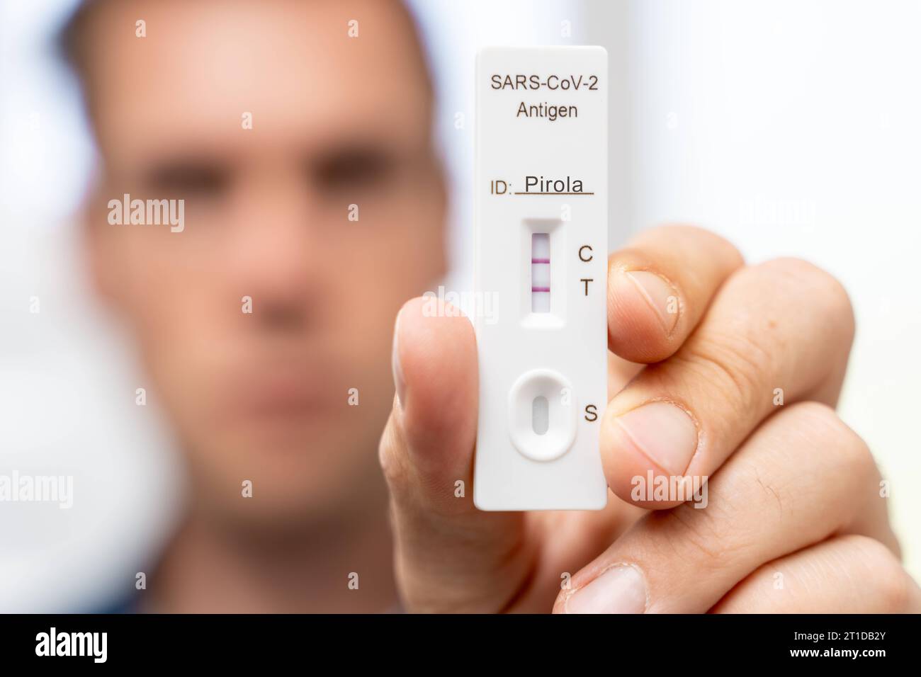 Augsburg, Bavaria, Germany. 13th Oct, 2023. Man shows positive Covid-19 ...