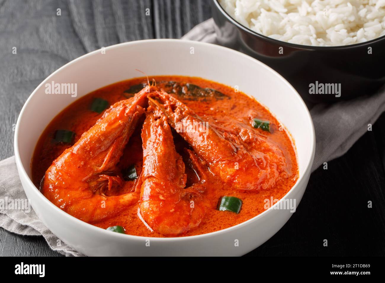 Chingri malai curry also known as prawn malai curry made from tiger and king prawns and coconut ...