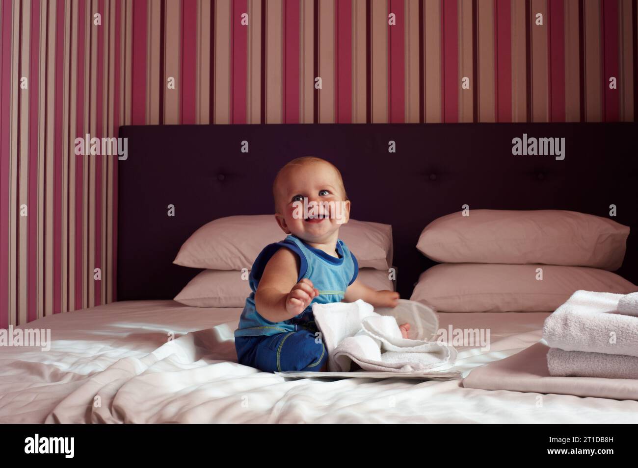 Cute newborn baby playing at home Stock Photo - Alamy