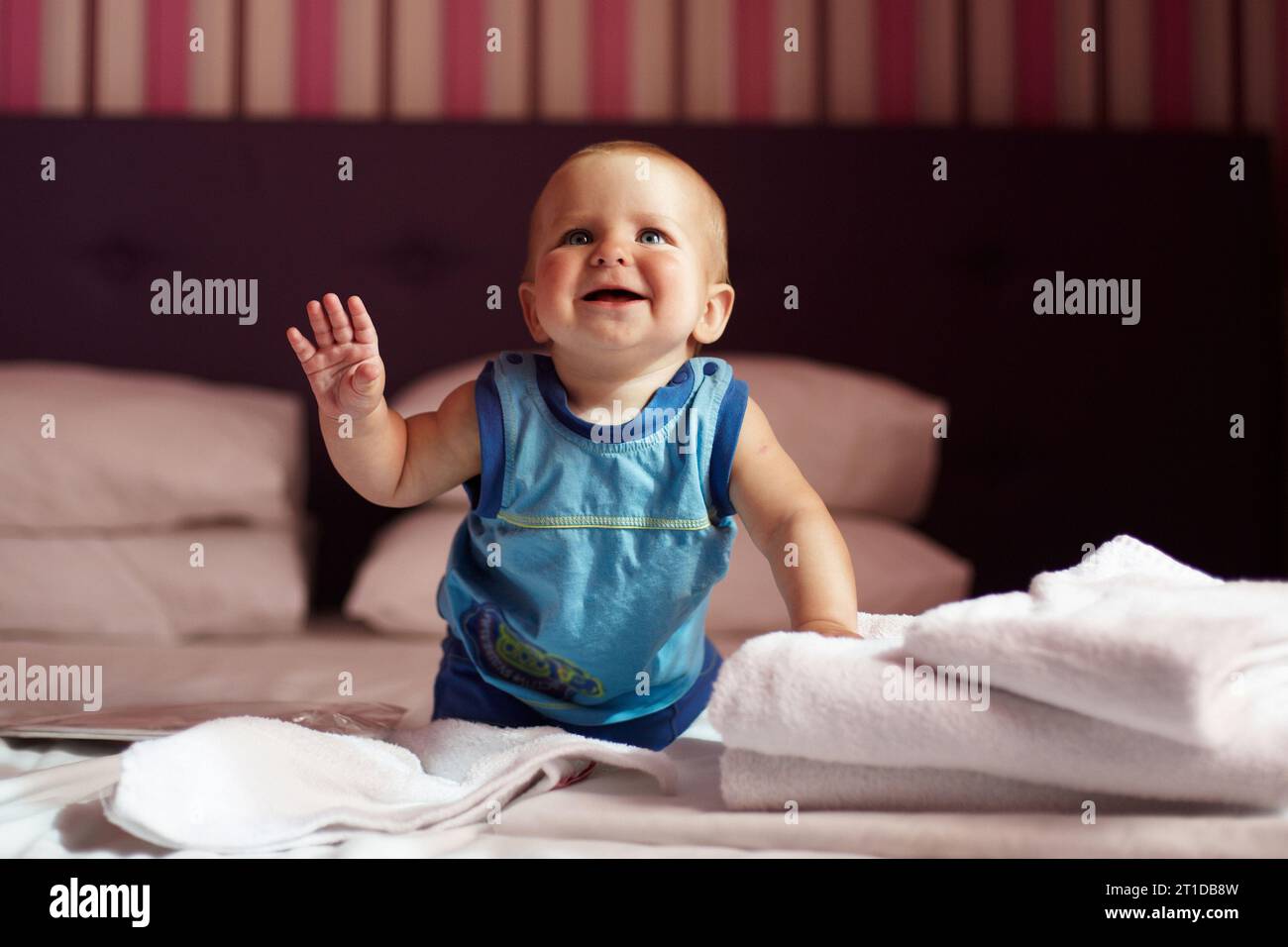 Cute newborn baby playing at home Stock Photo - Alamy