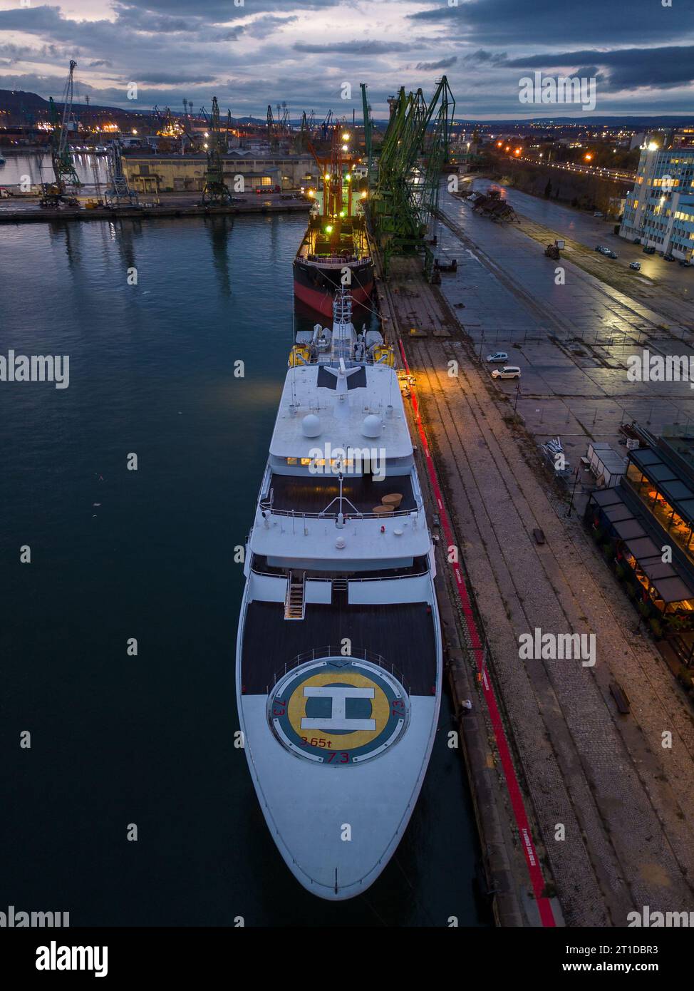aerial drone view of luxury yacht in port at night Stock Photo - Alamy