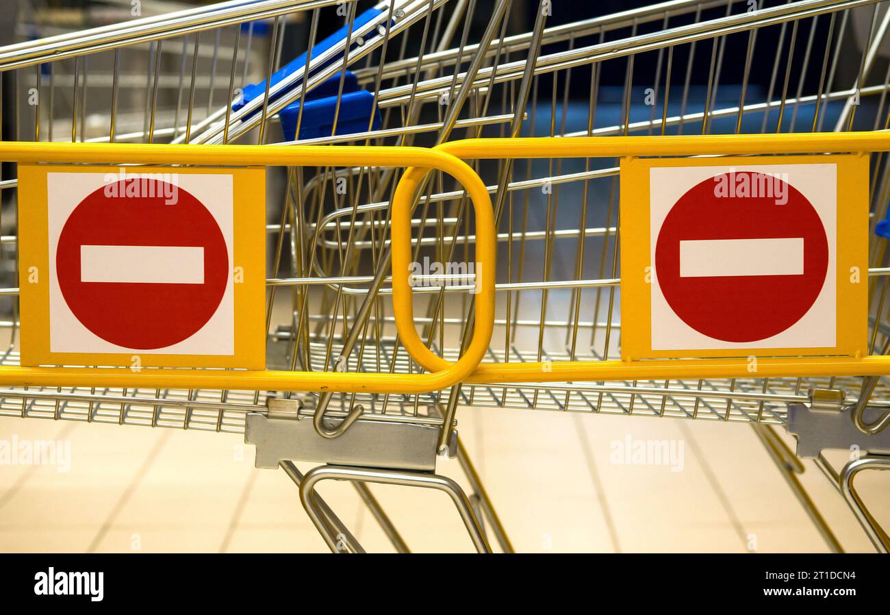 Trolley in the store. stop sign. Concept of ban, end of trade. Closed ...