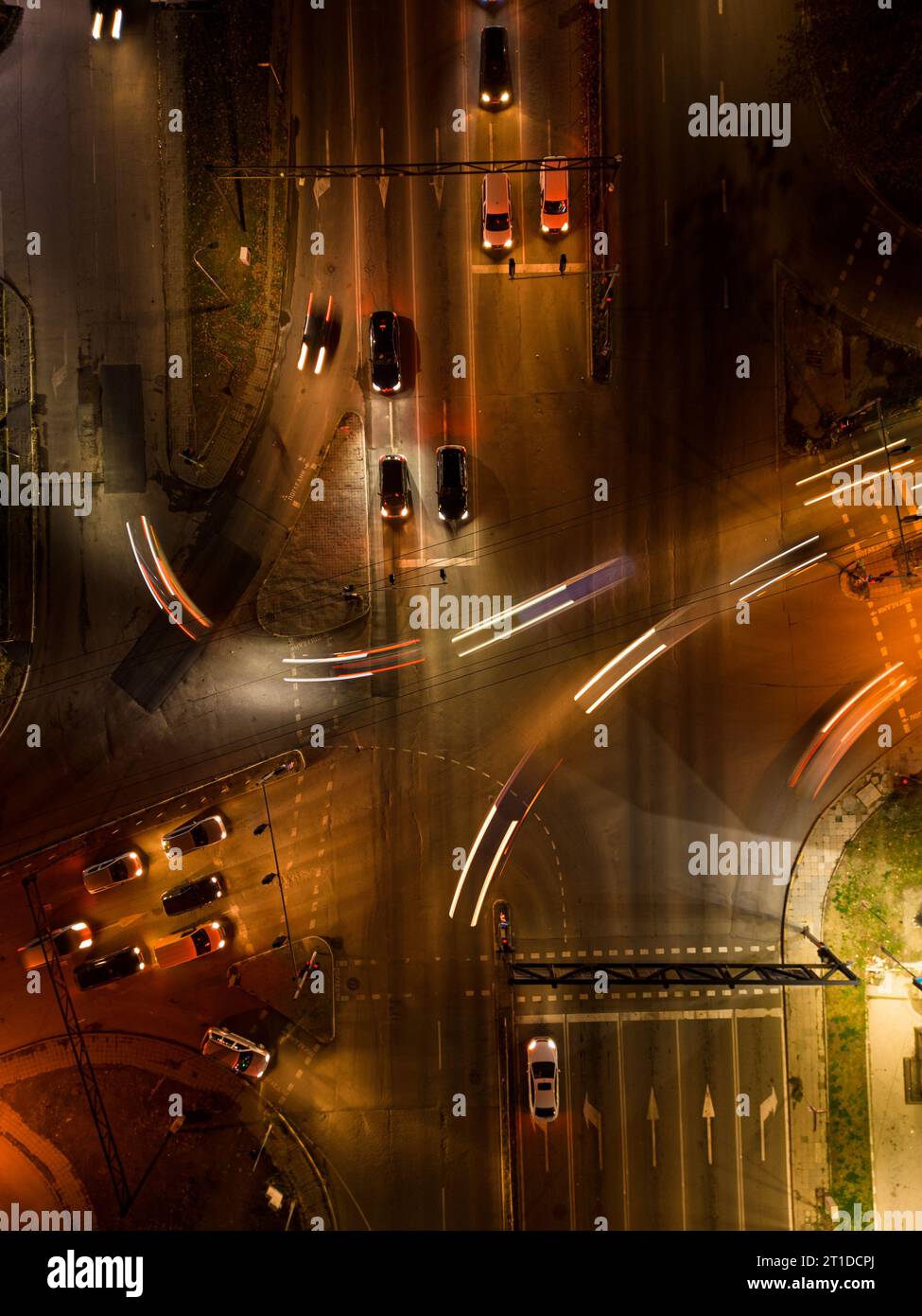 Aerial top down view of crossroads with cars at night Stock Photo - Alamy