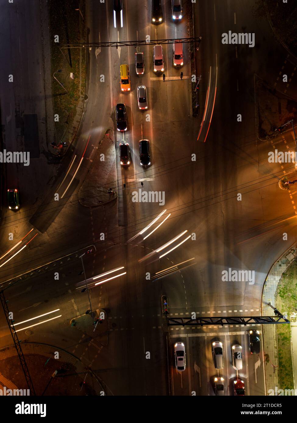 Aerial top down view of crossroads with cars at night Stock Photo - Alamy