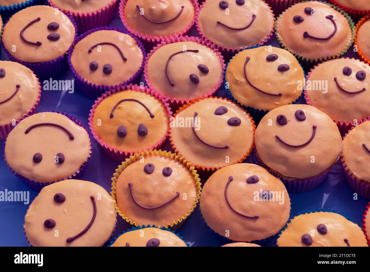 Smiley faces. smile cakes on table. The concept teamwork, friends ...