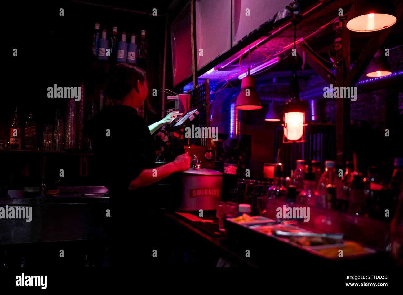 Bartender serves cocktail customer hi-res stock photography and images ...