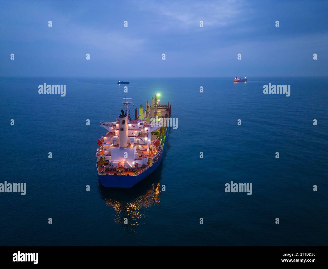 Aerial top view cargo bulk carrier ship on the sea at night Stock Photo ...