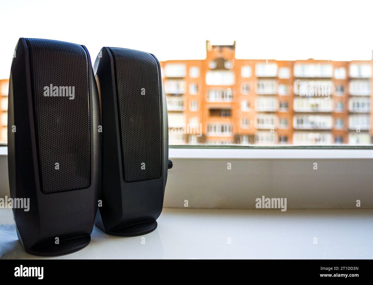 computer speakers close up. columns At a window against the background ...