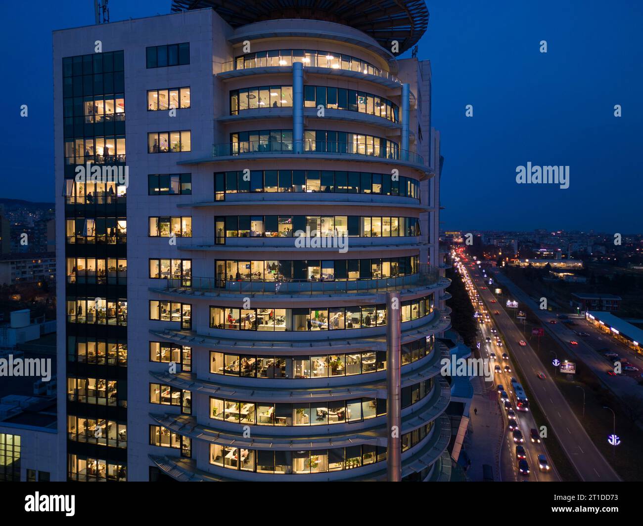 office building at night. Aerial drone flying view Stock Photo - Alamy