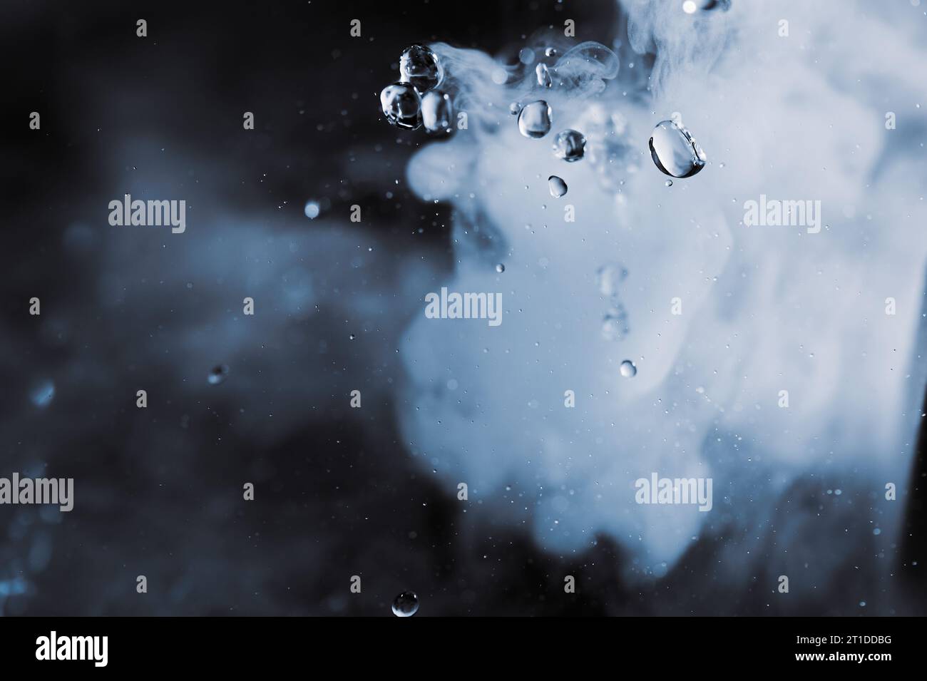 Boiling water splash with steam on black background close-up Stock ...