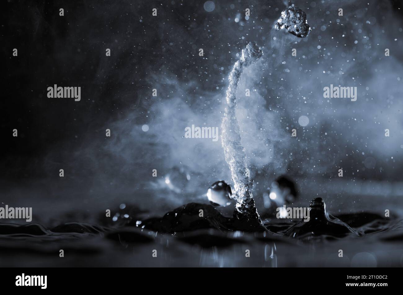 Boiling water splash with steam on black background close-up Stock ...