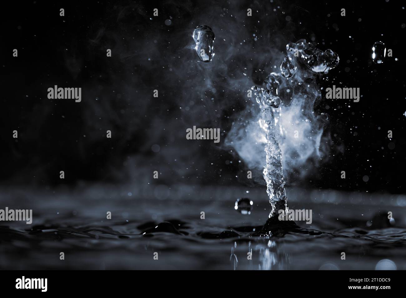Boiling water splash with steam on black background close-up Stock ...