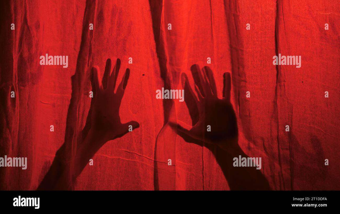 Hands on blood red canvas hi-res stock photography and images - Alamy