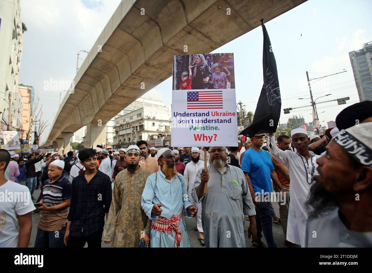 Dhaka, Bangladesh. 13th Oct, 2023. Protestors wave Palestinian flags as ...