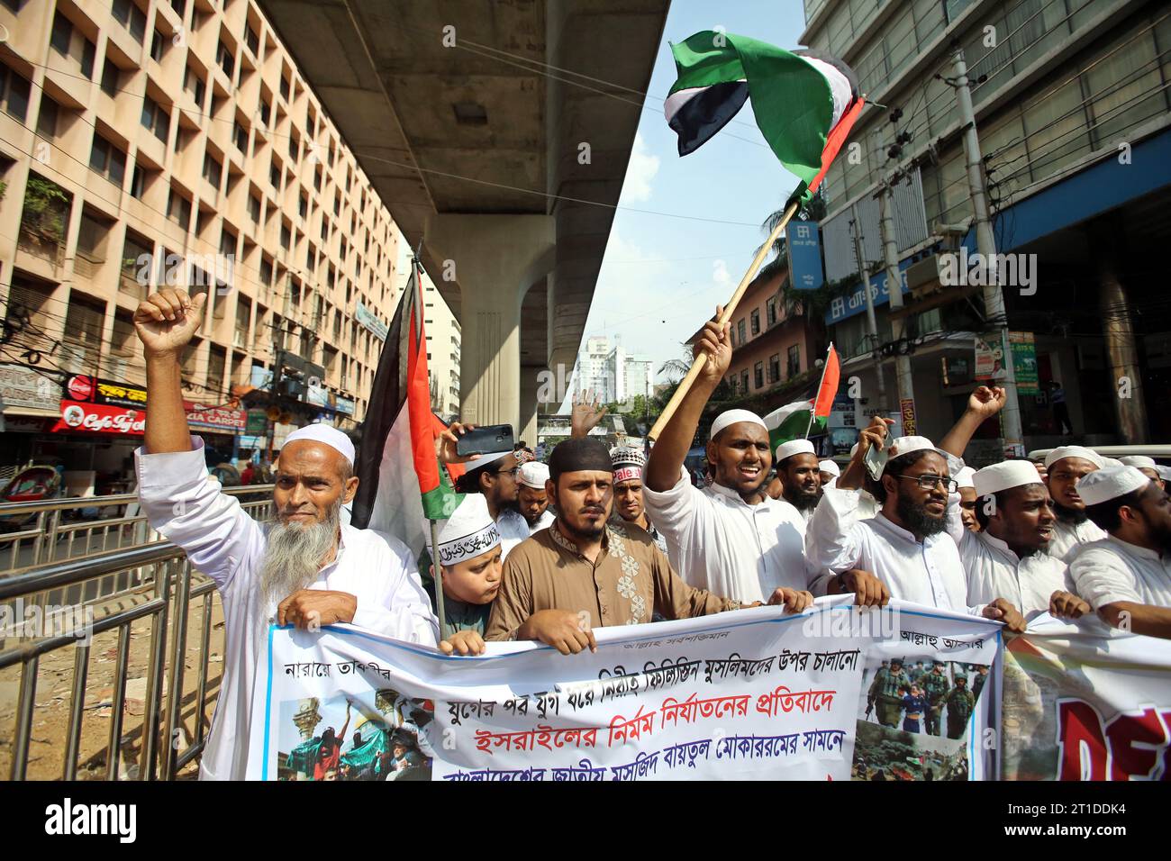 Dhaka, Bangladesh. 13th Oct, 2023. Protestors wave Palestinian flags as ...