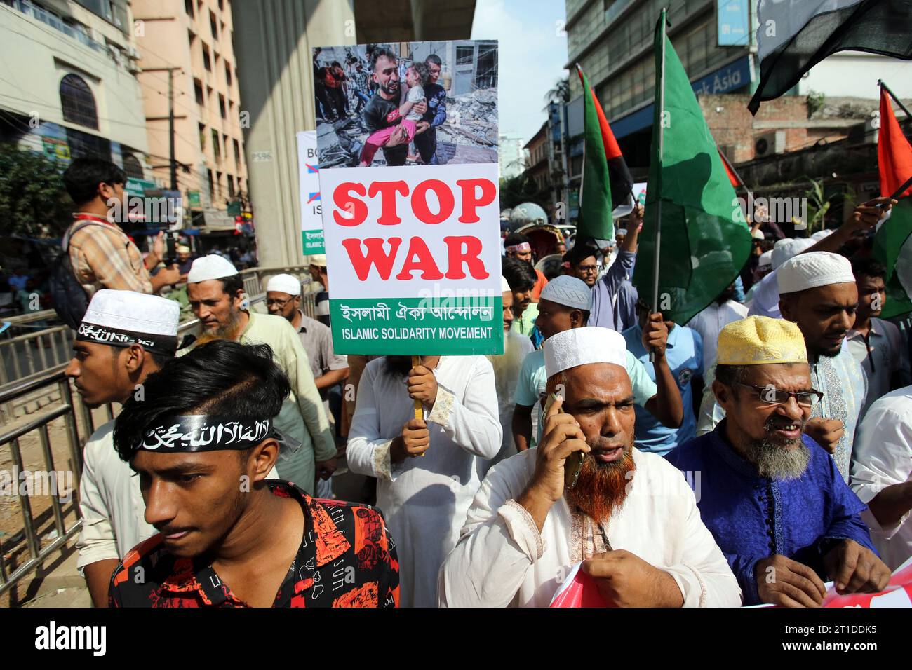 Dhaka, Bangladesh. 13th Oct, 2023. Protestors wave Palestinian flags as ...