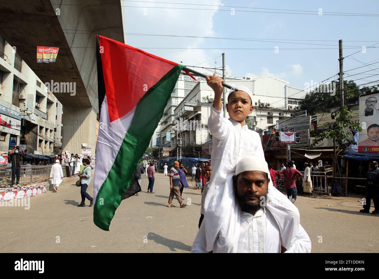 Dhaka, Bangladesh. 13th Oct, 2023. Protestors wave Palestinian flags as ...