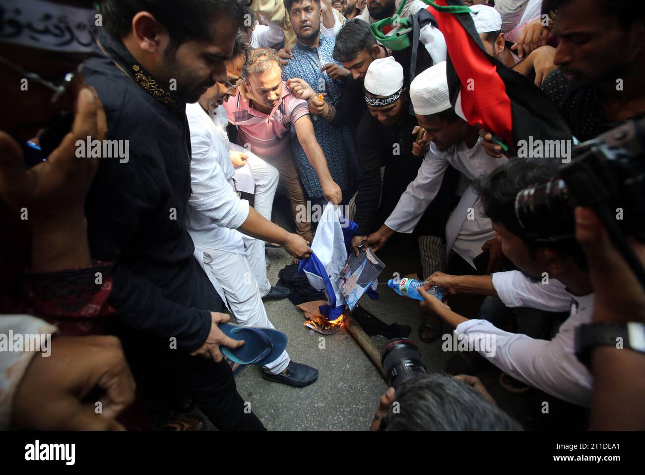 Dhaka, Bangladesh. 13th Oct, 2023. Protestors wave Palestinian flags as ...