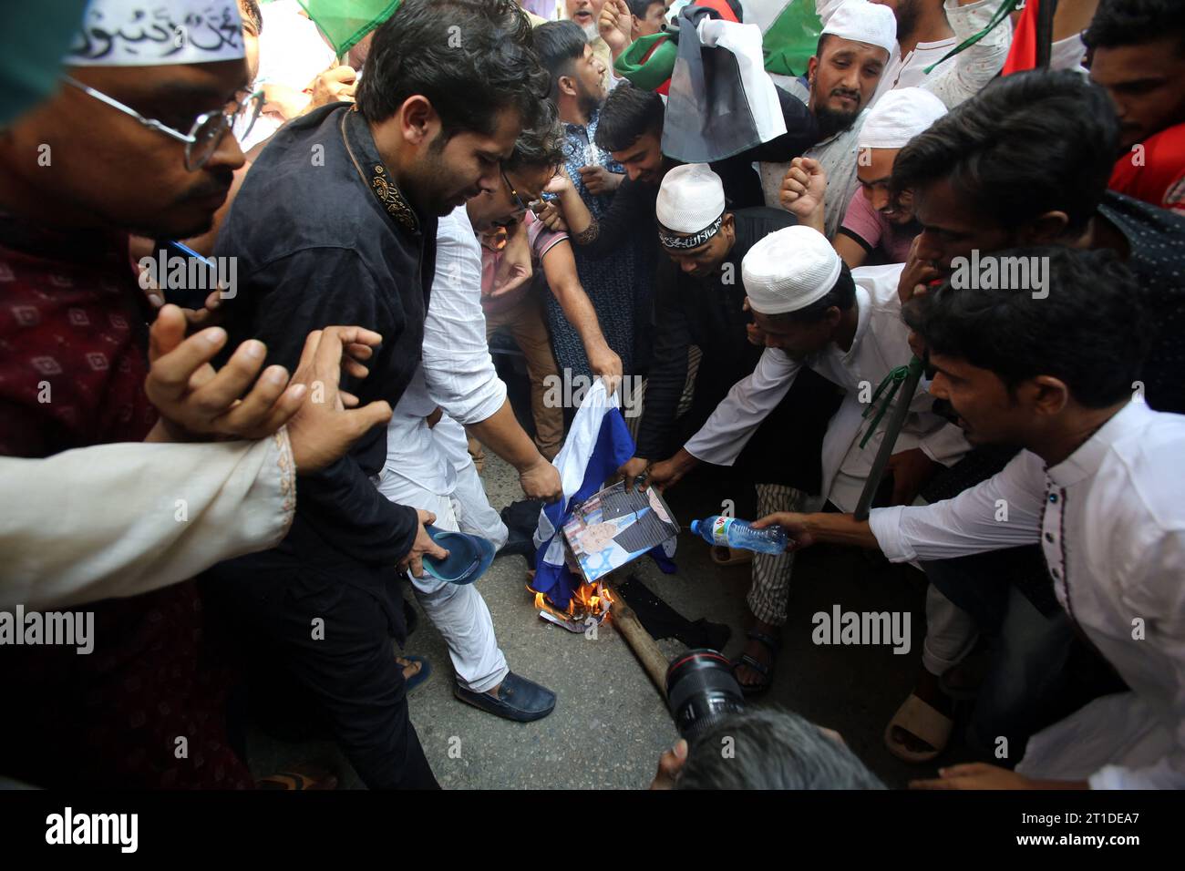 Dhaka, Bangladesh. 13th Oct, 2023. Protestors wave Palestinian flags as ...