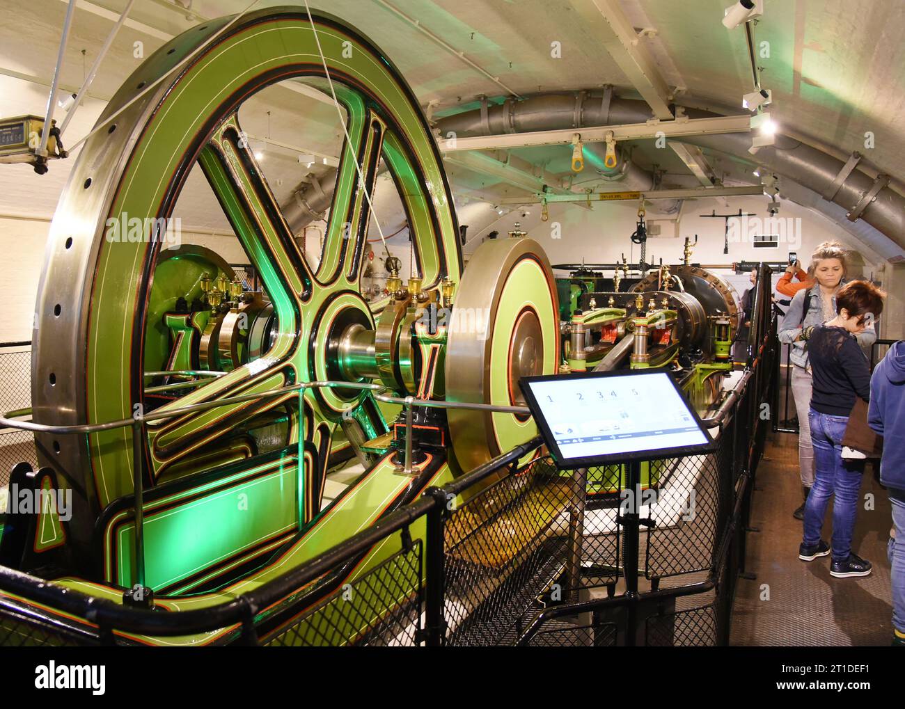 London, UK. 27th May, 2022. Under London's Tower Bridge, visitors look ...