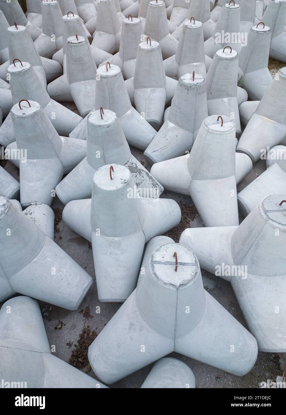 New concrete tetrapods in a factory storage Stock Photo - Alamy