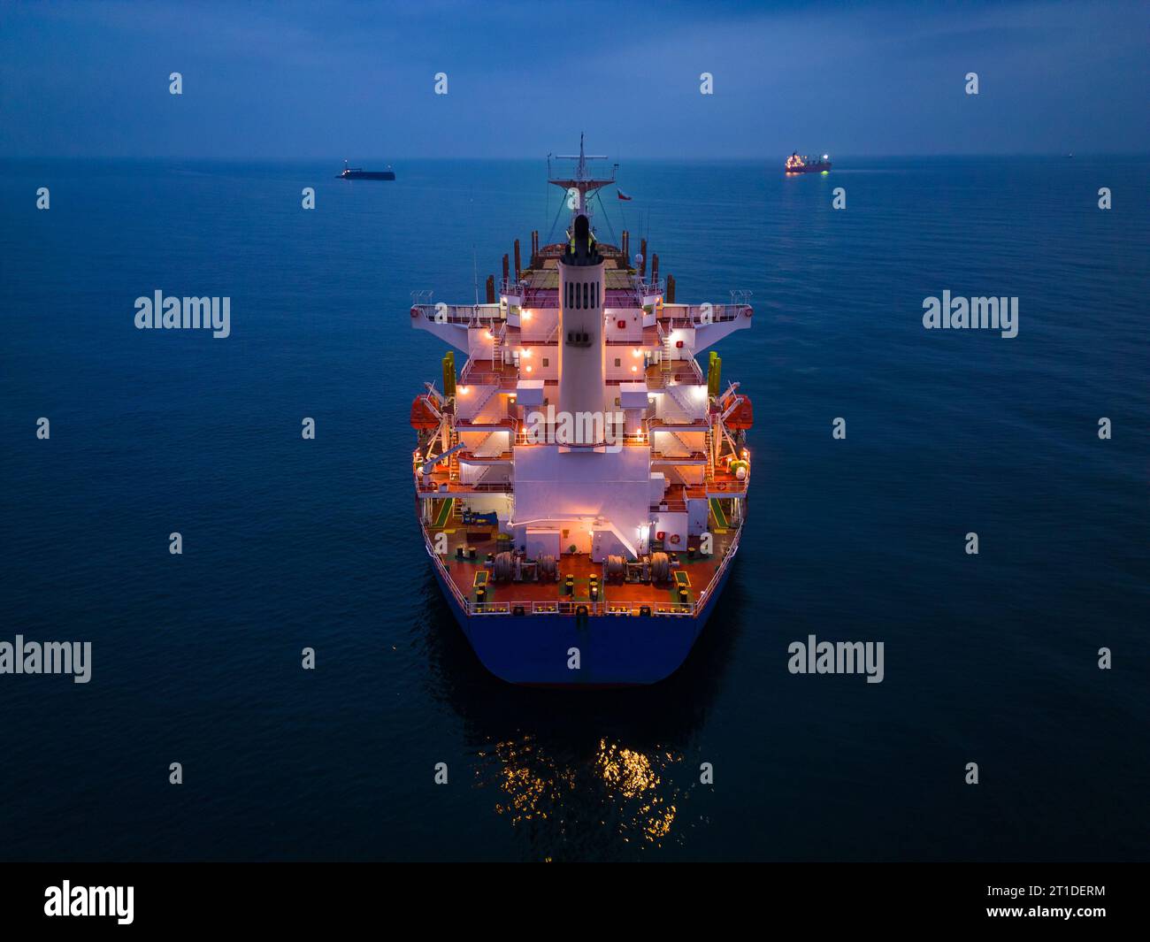 Aerial top view cargo bulk carrier ship on the sea at night Stock Photo ...